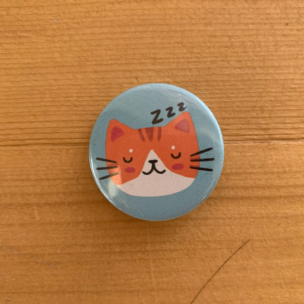 Sleeping Orange Tabby-on-White Cat Pinback Button | Kitties & Cream